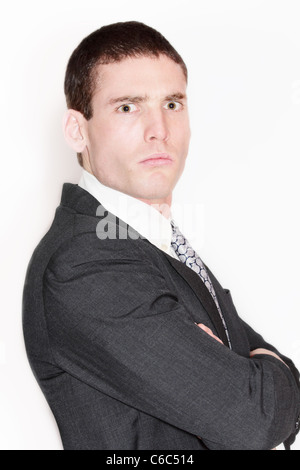 Strict man in elegant suit. White background Stock Photo - Alamy