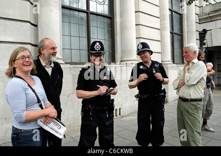 Two Welsh Heddlu or police officers, dressed in riot gear on the ...