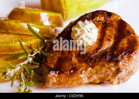 Wild boar steak with herb butter Stock Photo - Alamy
