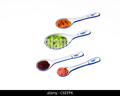 Studio shot of piles of spices on measuring spoons Stock Photo - Alamy