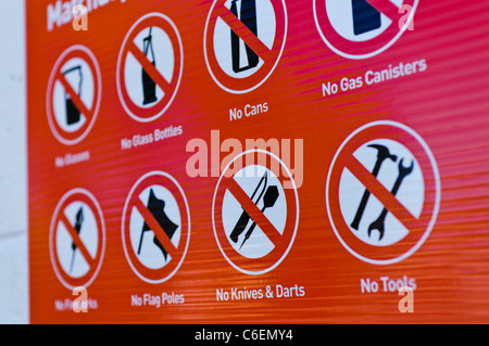 List of banned items on a notice board outside the entrance to a ...