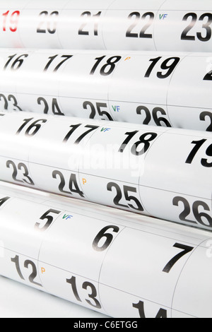 Rolled Up Calendar Pages Stock Photo - Alamy
