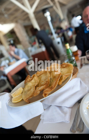 Traditional Tunisian food, brik fried pasteries with egg or some other ...