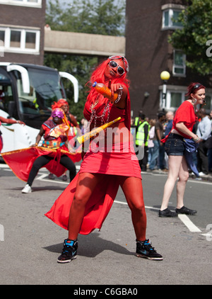 Dancers at Notting Hill Carnival 2011 perform a Jamaican dance called ...