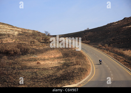 Scenic landscape with tar road and motorcycle Stock Photo - Alamy