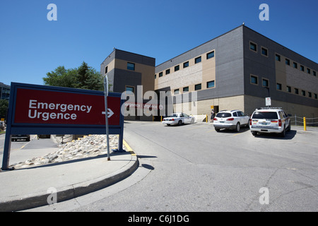 Emergency room entrance at a general hospital with ambulance parked in ...