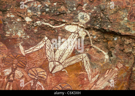 Aboriginal art. Anbangbang gallery. Paintings on a rock wall made with ochre. Sacred site ...