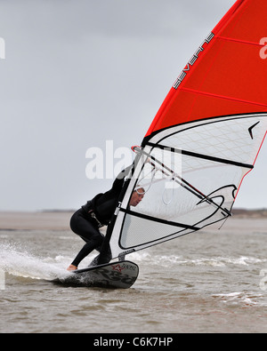 Wind surfer windsurfer Stock Photo - Alamy