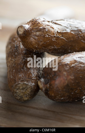 Raw Cassava Root And Starch - Manioc Esculenta; On Wooden Background ...