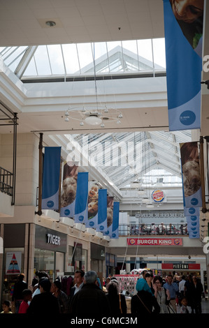 Shoppers inside St Georges shopping centre in Harrow town centre ...