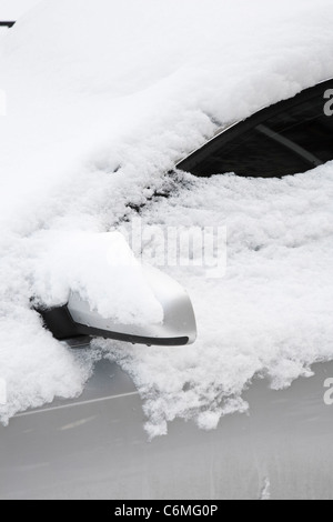 Ice covers the windscreen of a car in Montreal, Monday, Dec. 29, 2025 ...