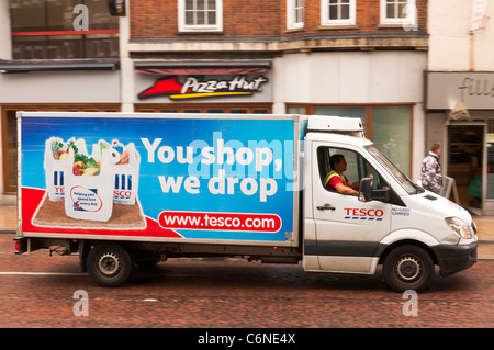 Tesco van delivering shopping in a city centre in England Stock Photo ...