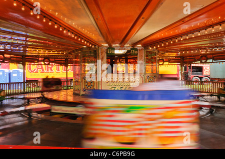 A fast spinning ride at a UK funfair Stock Photo - Alamy