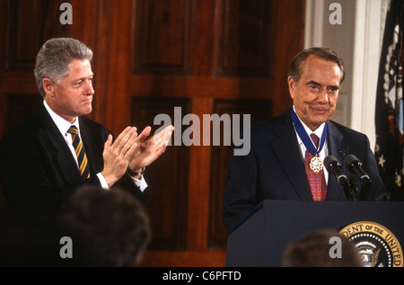 President Bill Clinton awards Senator Bob Dole the Medal of Freedom at ...