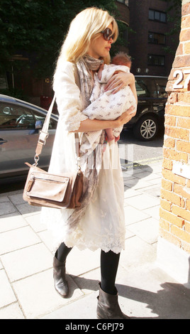 Claudia Schiffer out and about carrying her baby daughter Cosima Violet ...
