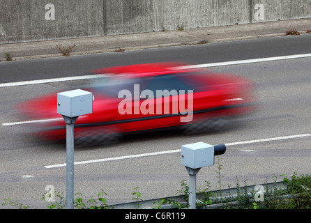 Speed cameras and flash at the A44 Autobahn, motorway. Controlling a ...