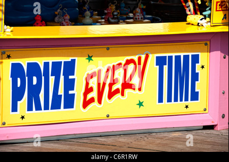 Prize every time sign at seaside amusements. UK Stock Photo - Alamy