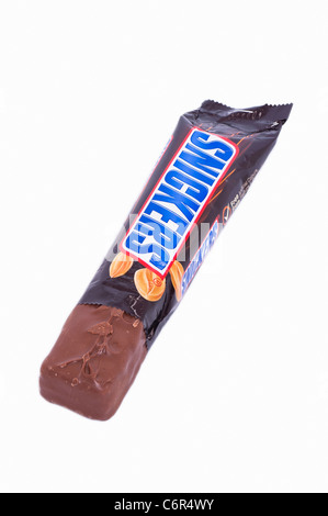 Snickers chocolate bar on white background with open cut up bar by the ...