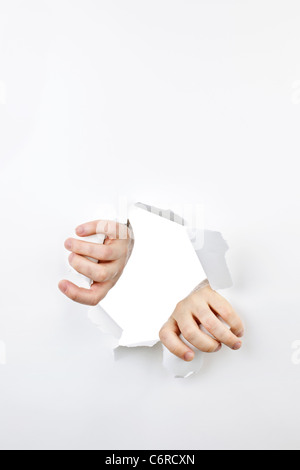 Hands tearing paper sheet Stock Photo - Alamy