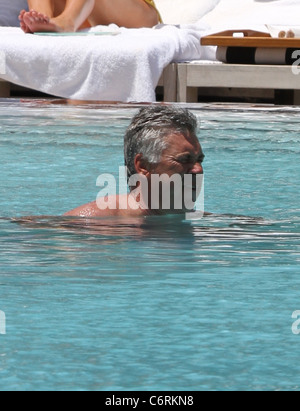 Chelsea FC boss Carlo Ancelotti and his partner Marina Cretu relaxing ...
