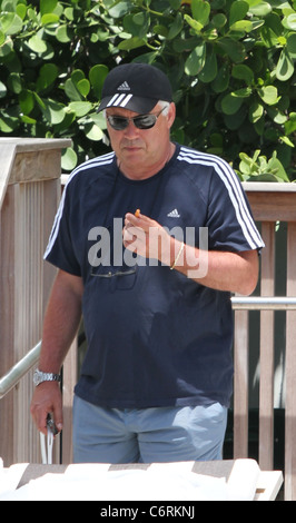 Chelsea FC boss Carlo Ancelotti and his partner Marina Cretu relaxing ...