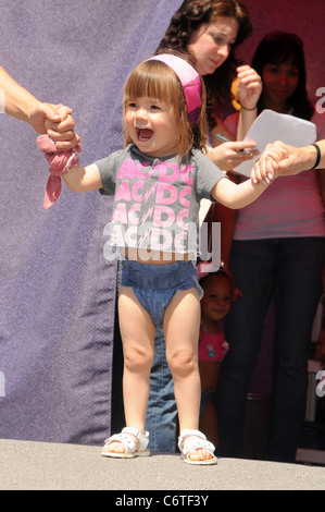 A young child models Huggies Denim Diapers Rebecca Romijn hosts a Baby ...