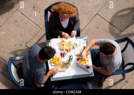 People Eating Fish and Chips Stock Photo - Alamy