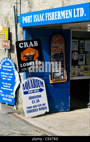 The sign outside a fish merchant store near the harbour at Port Isaac ...