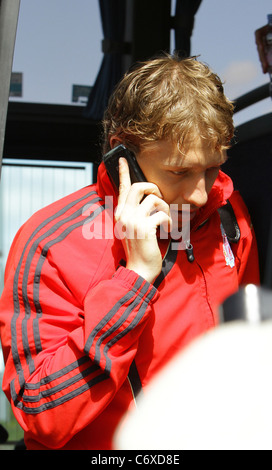 Liverpool Footballer catching a train at Runcorn station as flights out ...