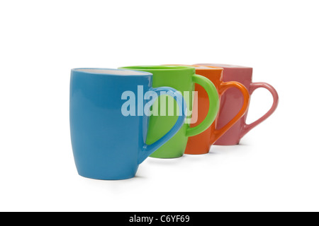 Colourful mugs in a row Stock Photo - Alamy