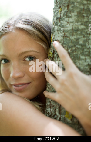Woman hugging a tree - tree hugger/tree huggers Stock Photo - Alamy