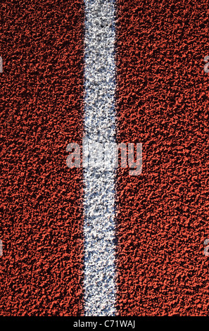 Close up vertical image of the red tail light and exhaust pipes of a ...