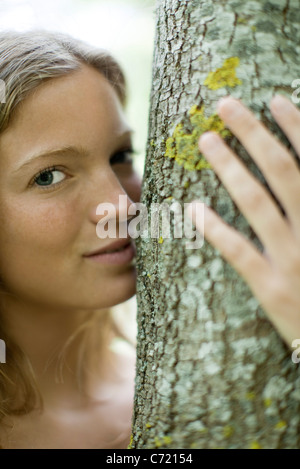 Woman hugging a tree - tree hugger/tree huggers Stock Photo - Alamy
