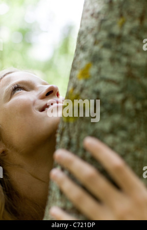 Woman hugging a tree - tree hugger/tree huggers Stock Photo - Alamy