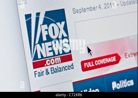 Fox News website homepage. Fox News channel logo visible through a ...