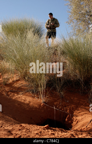 Researcher using radio telemetry to track wildlife in Oregon's Grande ...