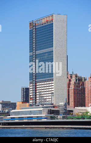 UN Headquarters, East River, Manhattan, Colourful flags of different ...