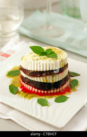 Blue cheese slice with salad leaves Stock Photo - Alamy