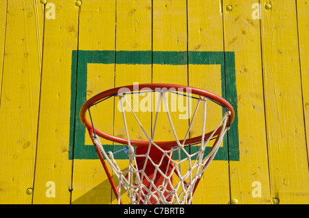 A closeup of a basketball hoop and net on the stand outdoors Stock ...
