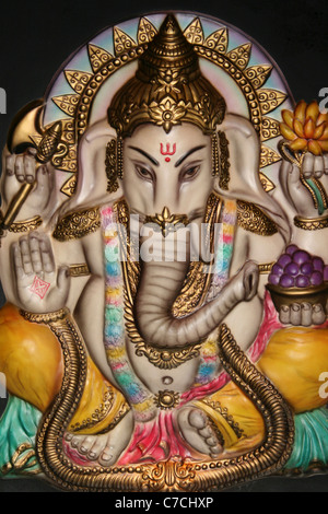 Hindu God Ganesha. Ganesha Idol on blue background Stock Photo - Alamy