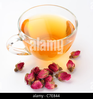 Cup of tea and dried roses on a wooden table Stock Photo - Alamy