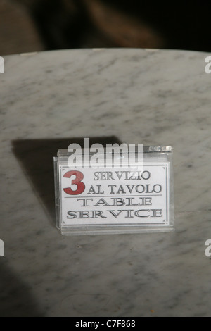 Table service only sign at the bar of the Latitude festival 2010 ...