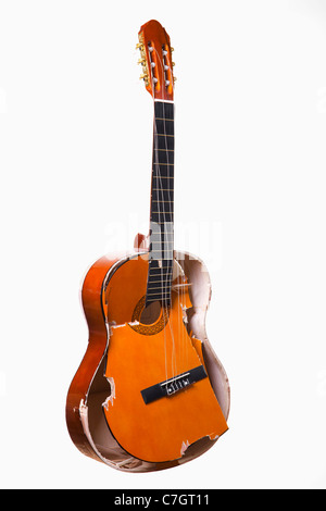 Broken acoustic guitar Stock Photo - Alamy