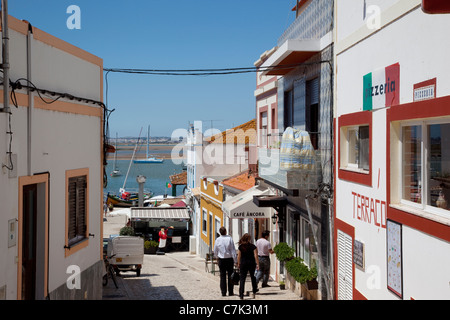 Portugal, The Algarve, Alvor Street Scene With Fish Restaurants Stock ...
