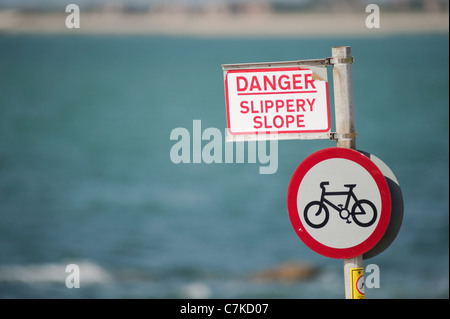 Slippery Slope sign on slipway Stock Photo - Alamy