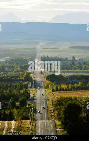 road to the city with mountains Stock Photo - Alamy