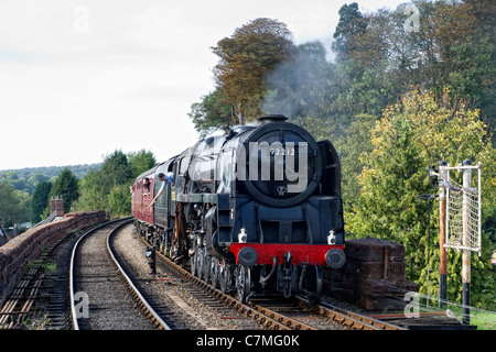 Steam locomotive 92212, British Railways Standard Class 9F, makes it's ...
