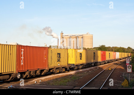 Heavy goods train passing through Lewisham Station Stock Photo - Alamy