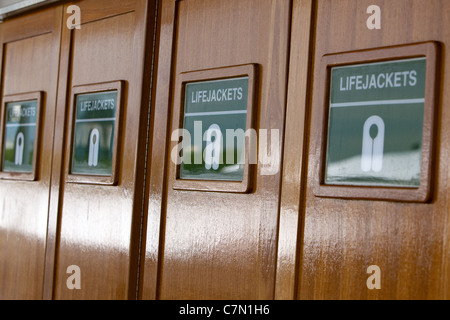 Lifejacket cabinets on boat deck for ship evacuation Stock Photo - Alamy