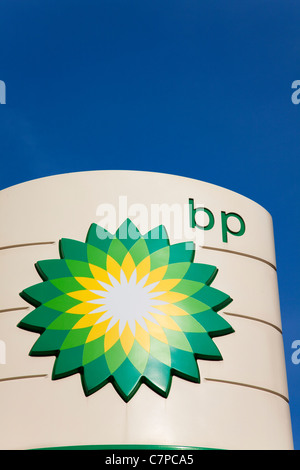 The BP logo at a petrol station with the BP Connect sign reflecting on ...